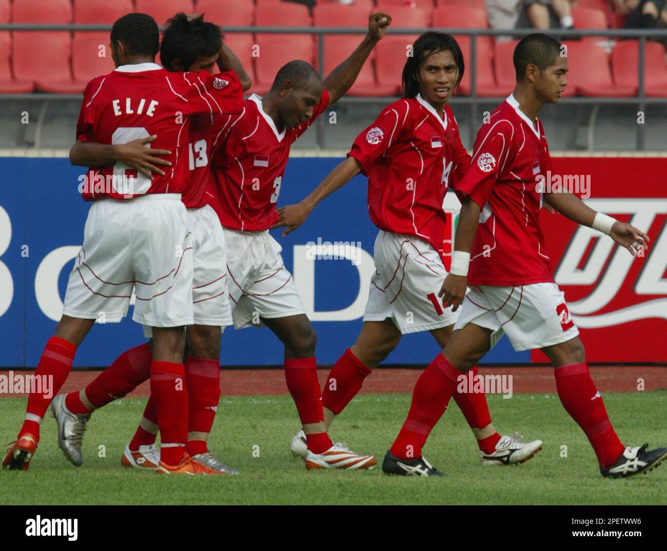 Indonesian players celebrate after helping Budi Sudarsono (13) score ...