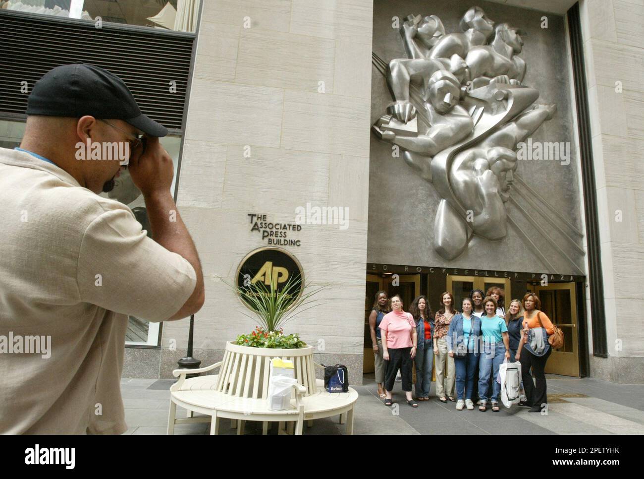 Lester Vigo photographs his co-workers from Associated Press' Corporate ...