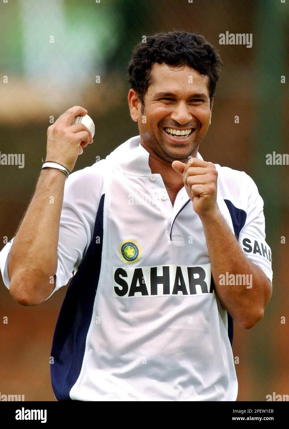 India's Sachin Tendulkar smiles during a practice session in Dambulla ...