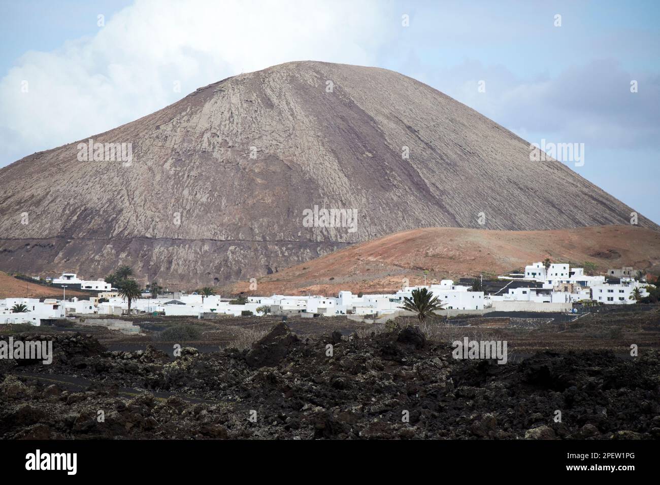 looking across volcanic rock formations and lava fields to distant ...