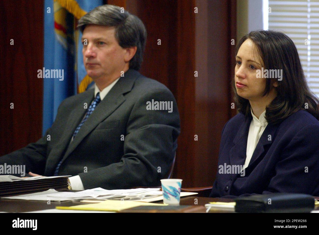 Brenda Andrew sits with on of her attorneys, Greg McCracken, as the ...