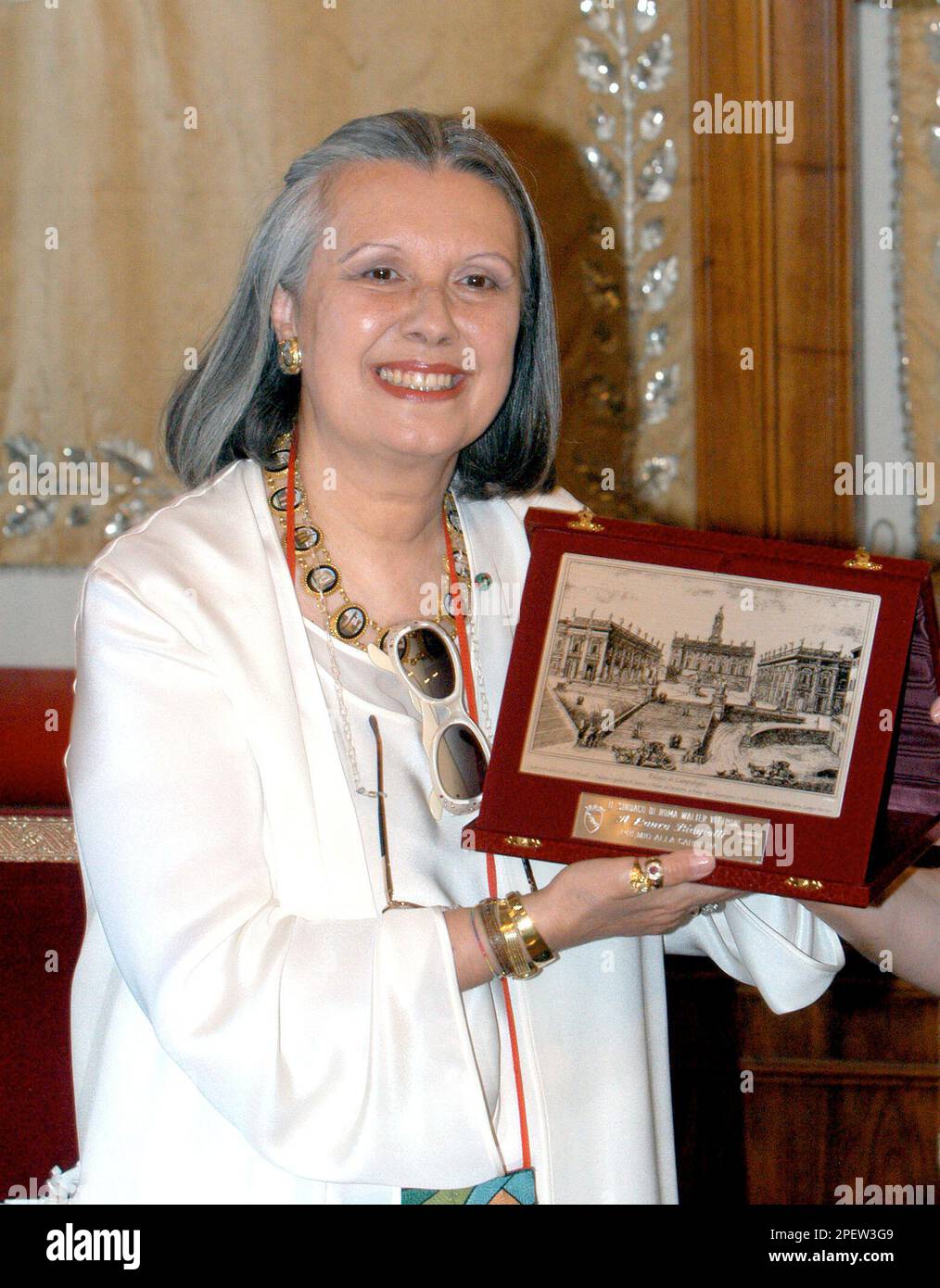 Italian designer Laura Biagiotti smiles with her "Career Prize ...
