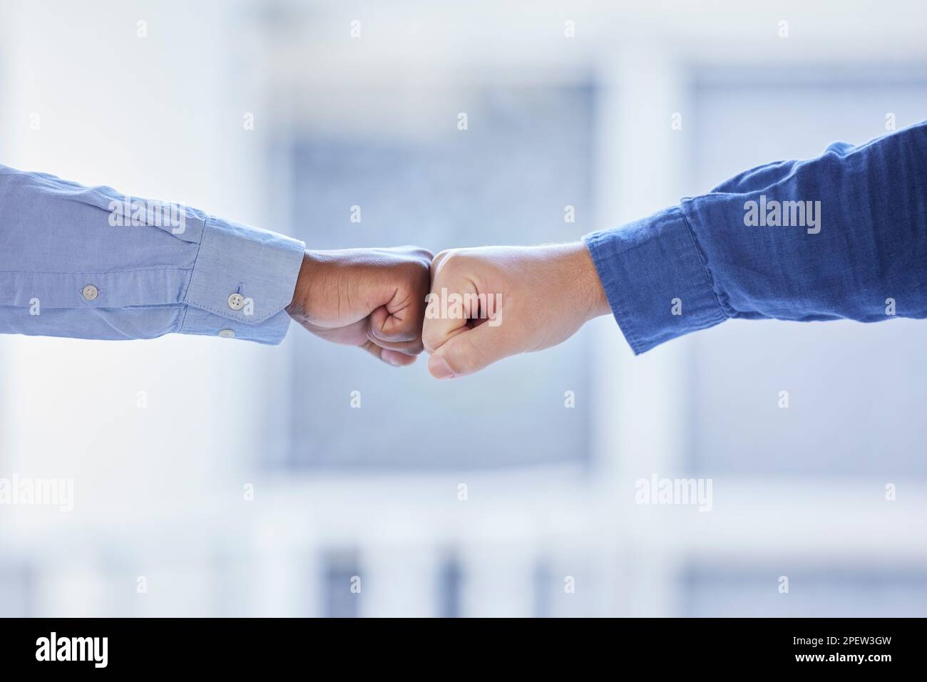 Fist bump, diversity and people or partner teamwork, partnership and ...