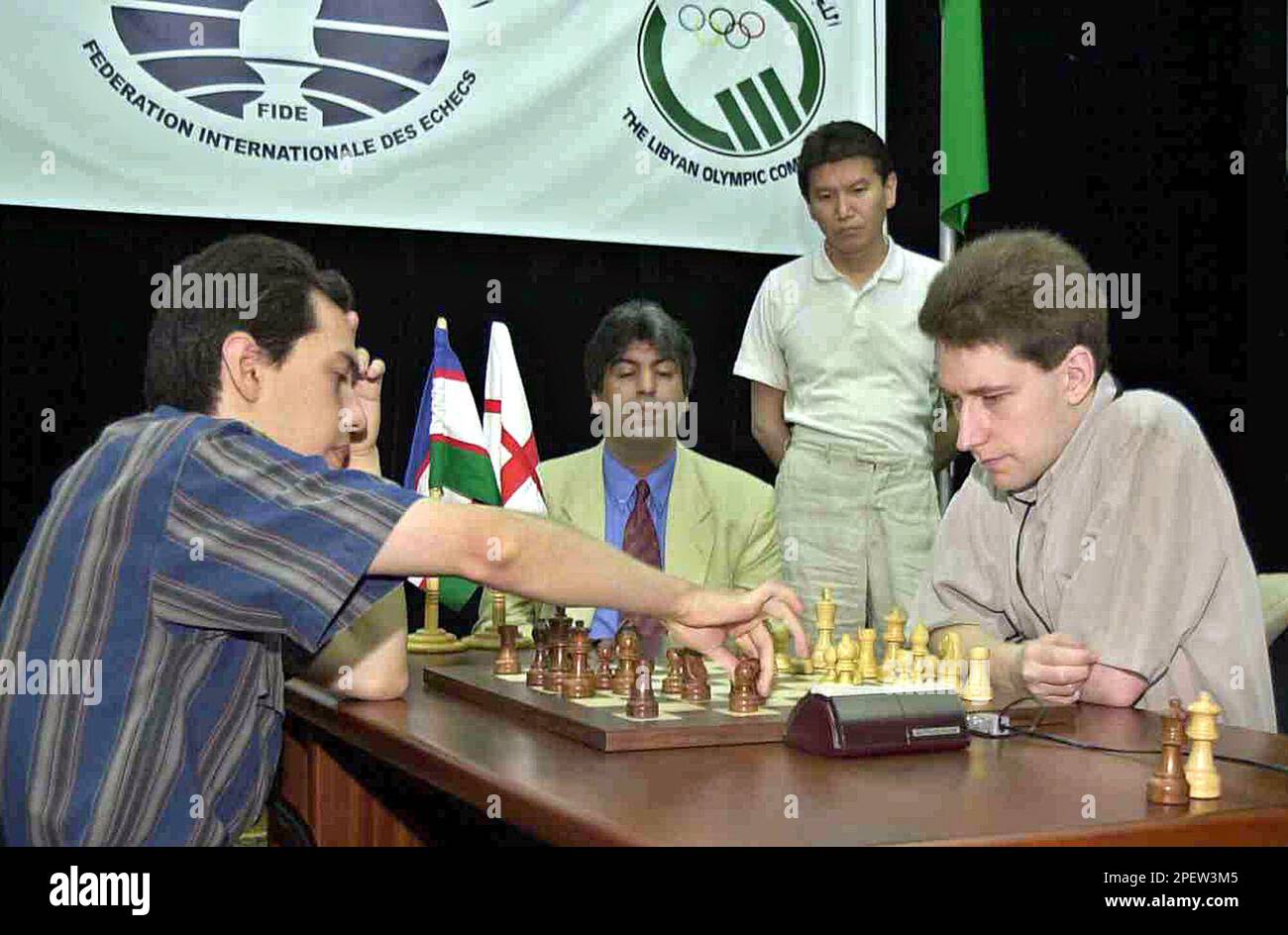 Uzbekistan's Rustam Kasimdzhanov makes a move against England's Michael ...