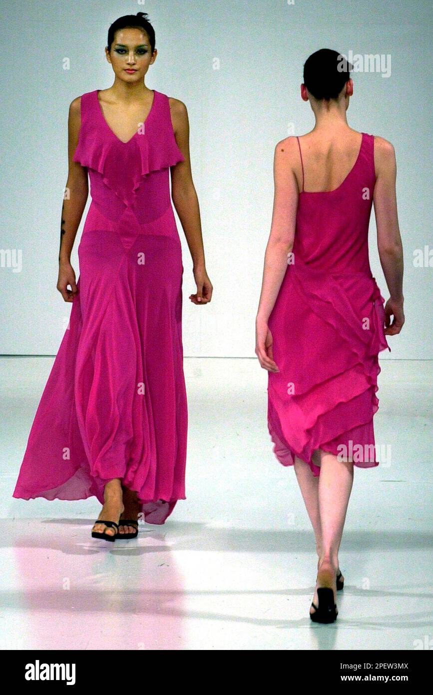 Two models show off gowns designed by Hong Kong's William Tang at Hong ...