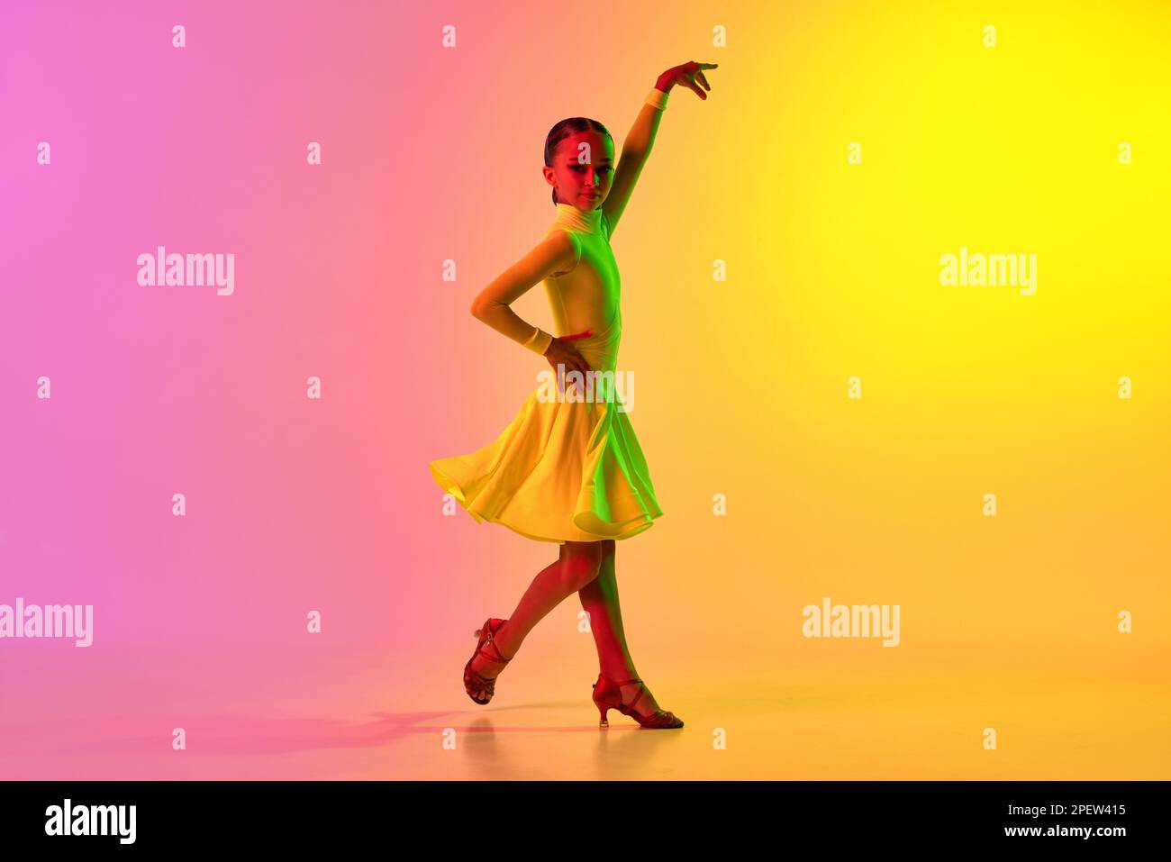 Elegant little girl in adorable stage outfit, dress dancing ballroom ...
