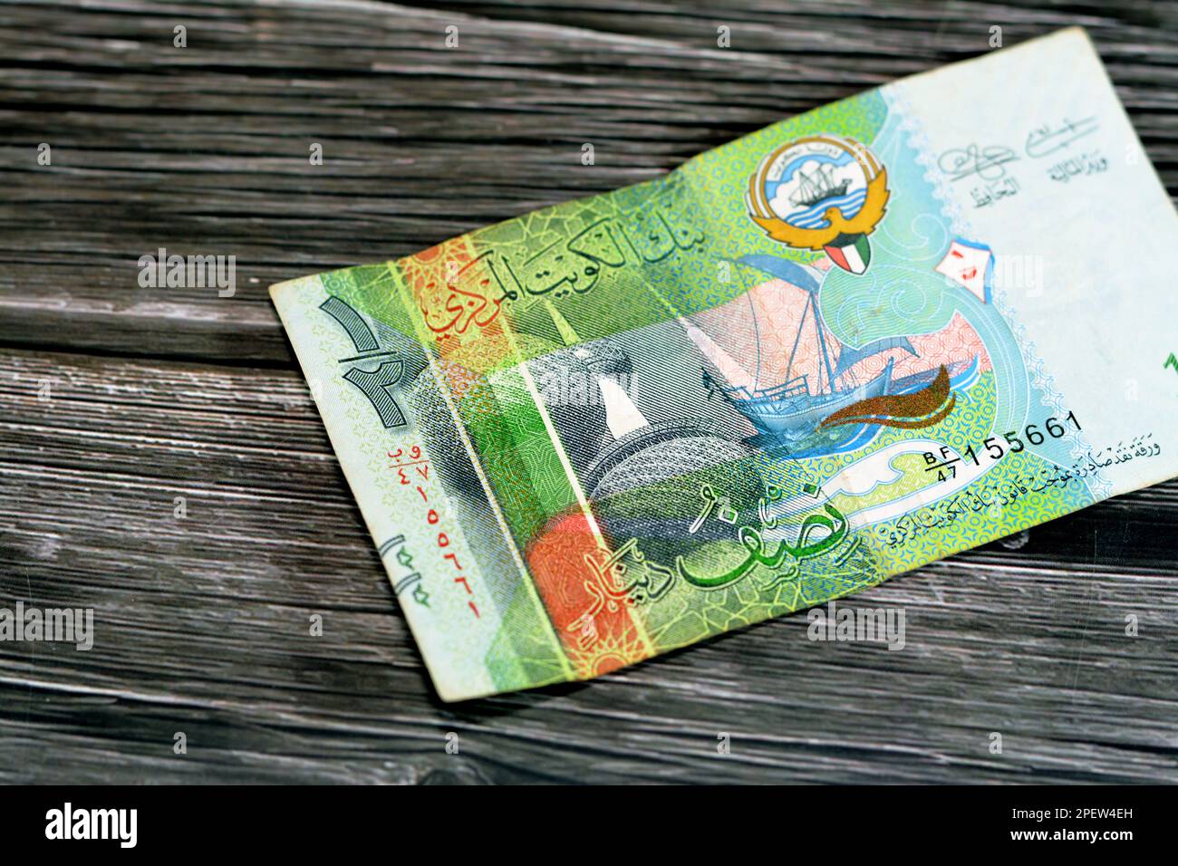 obverse side of Kuwaiti half dinar green paper banknote cash money bill ...