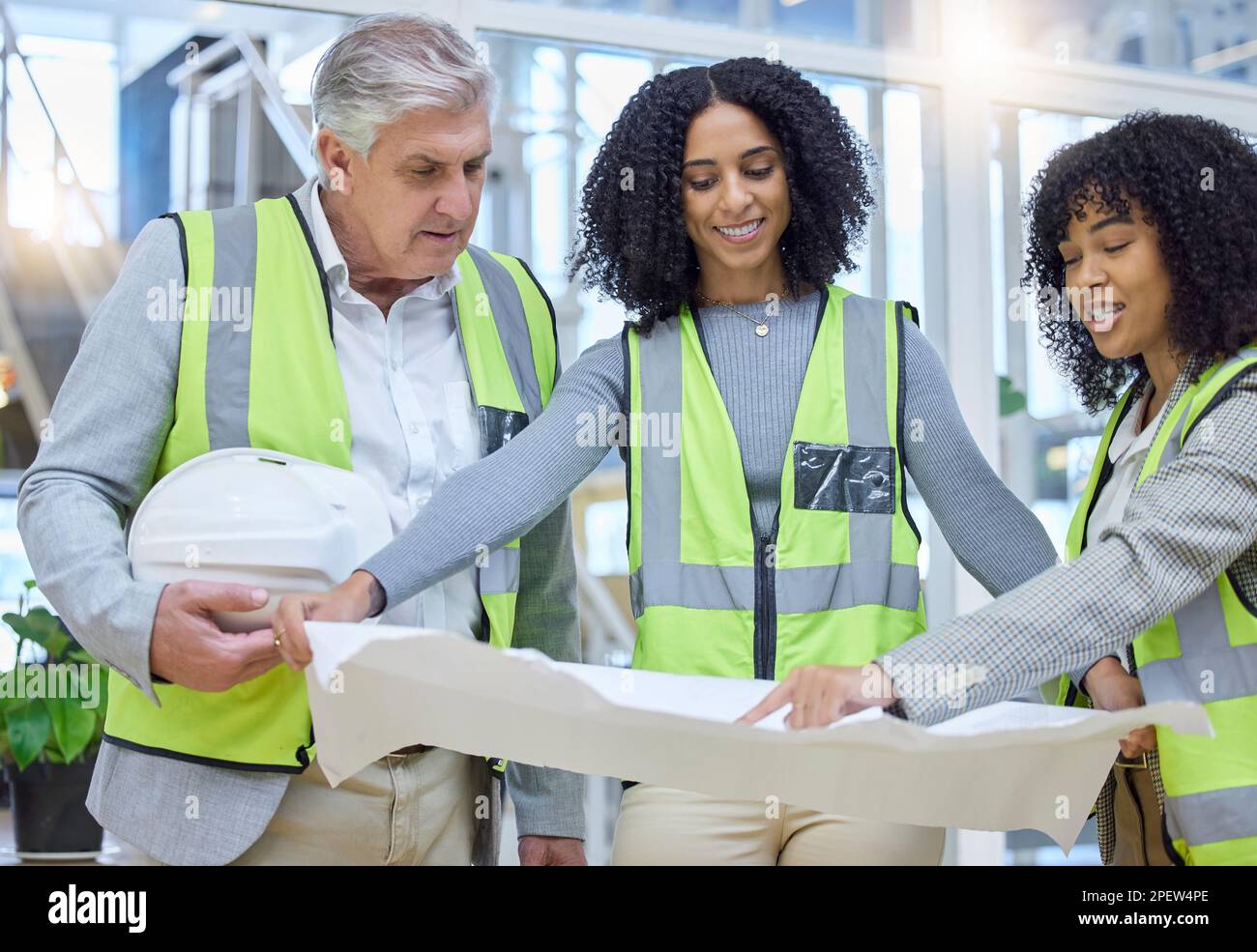 Architecture, blueprint and construction team planning building project ...