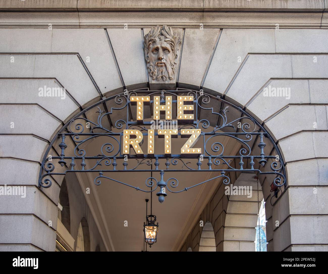 An ornate entrance to the iconic Ritz building, featuring a golden ...