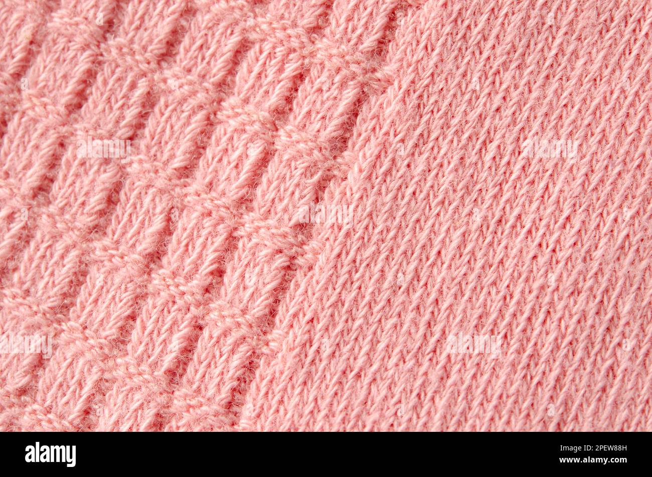 Texture of a knitted woolen pink color cloth. Background Stock Photo ...