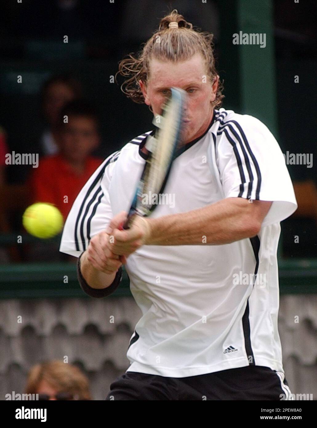 Alex Bogomolov Jr., hits a return to James Blake during the second set ...