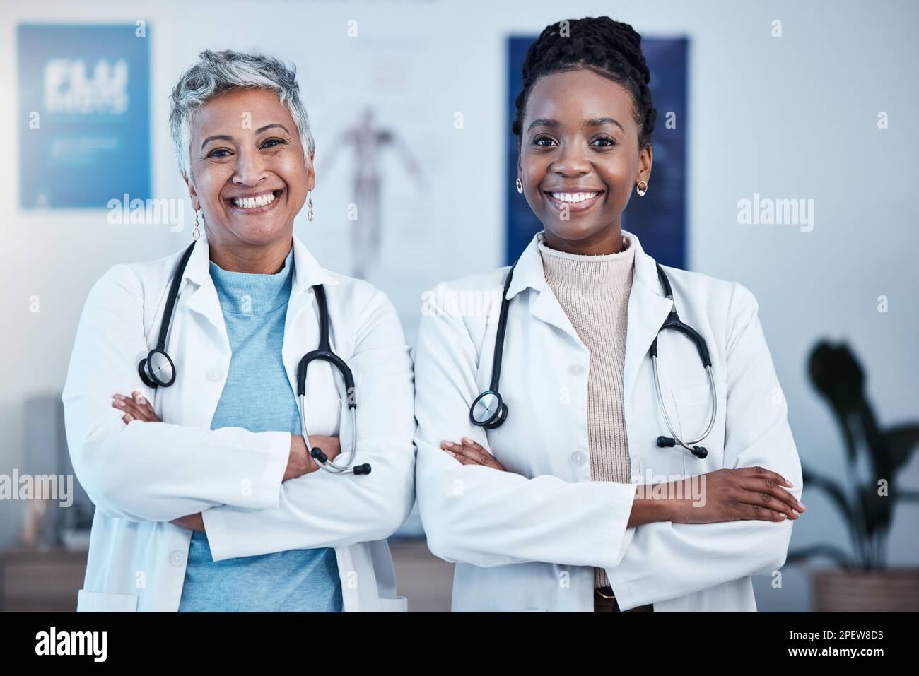 Portrait, happy and proud doctor team in hospital with vision, goal or ...