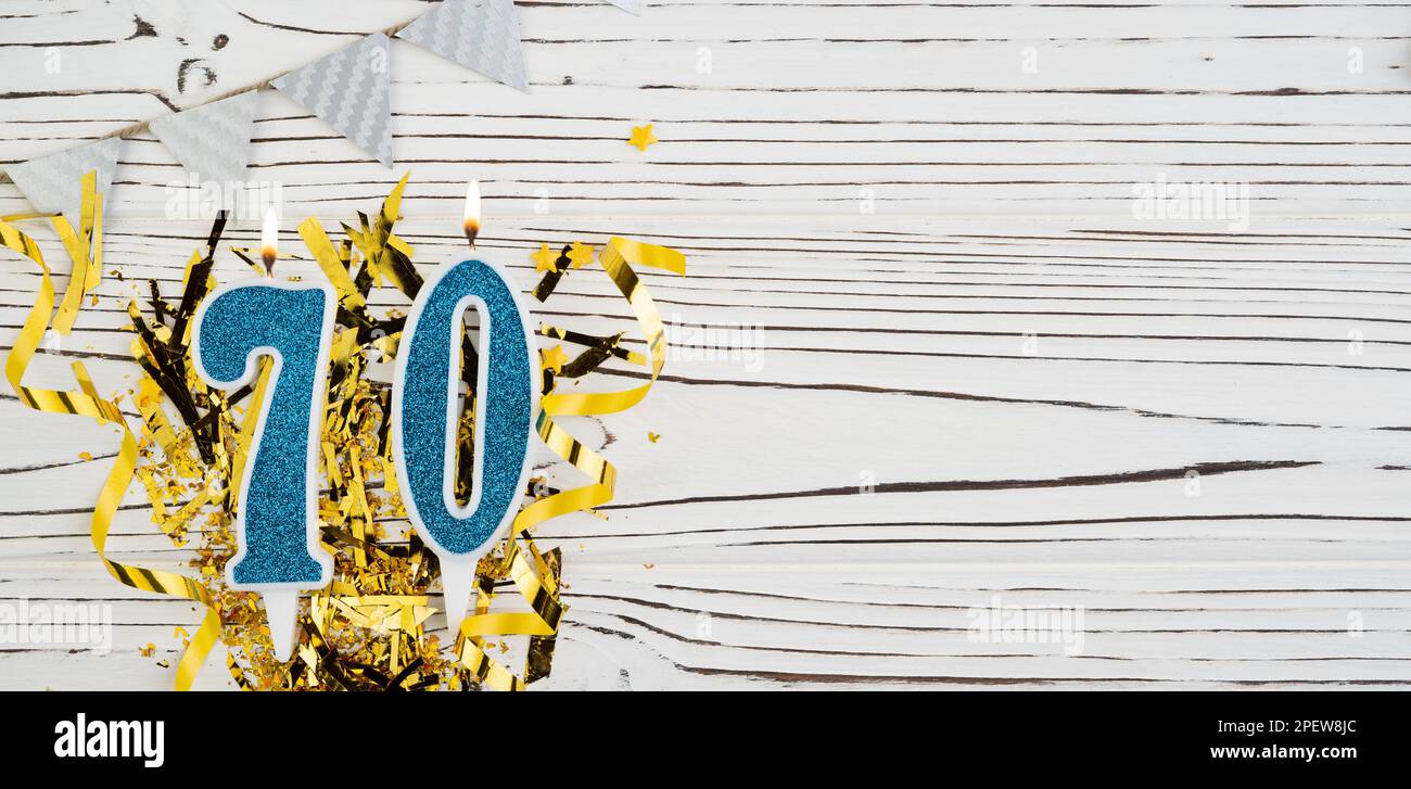 Blue candle number, digit seventy. Birthday greeting card with ...