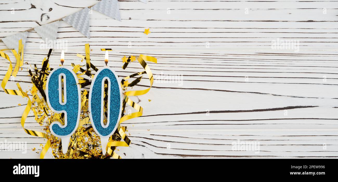 Blue candle number, digit ninety. Birthday greeting card with ...