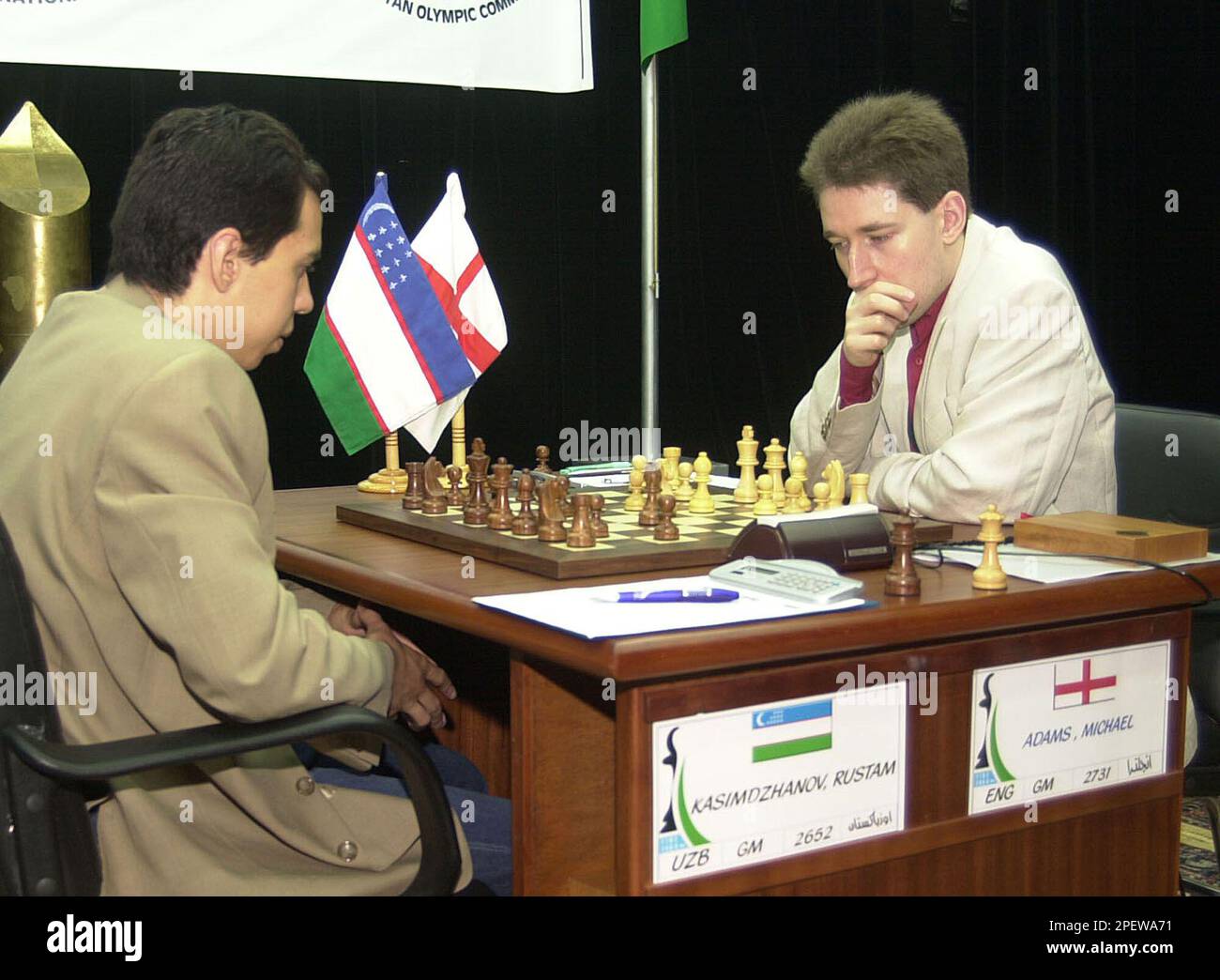 England's Michael Adams, right, and Uzbekistan's Rustam Kasimdzhanov ...