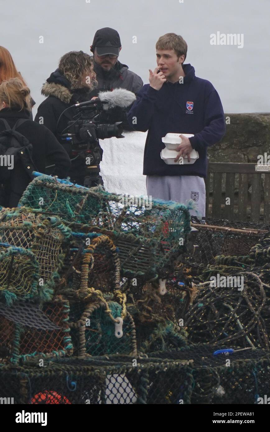 Actor Ed McVey, who plays the part of Prince William, on set in between ...