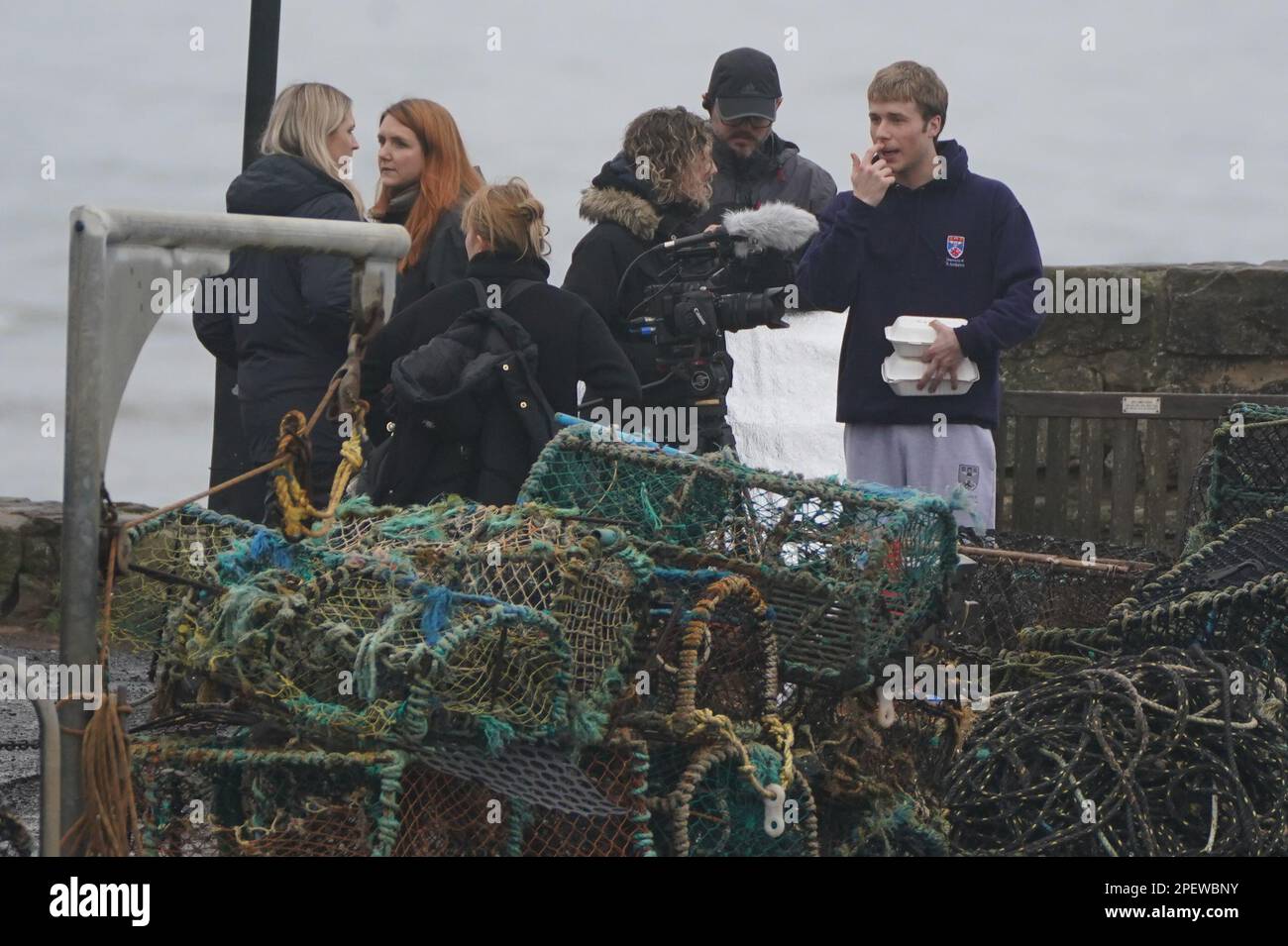 Actor Ed McVey, who plays the part of Prince William, on set in between ...