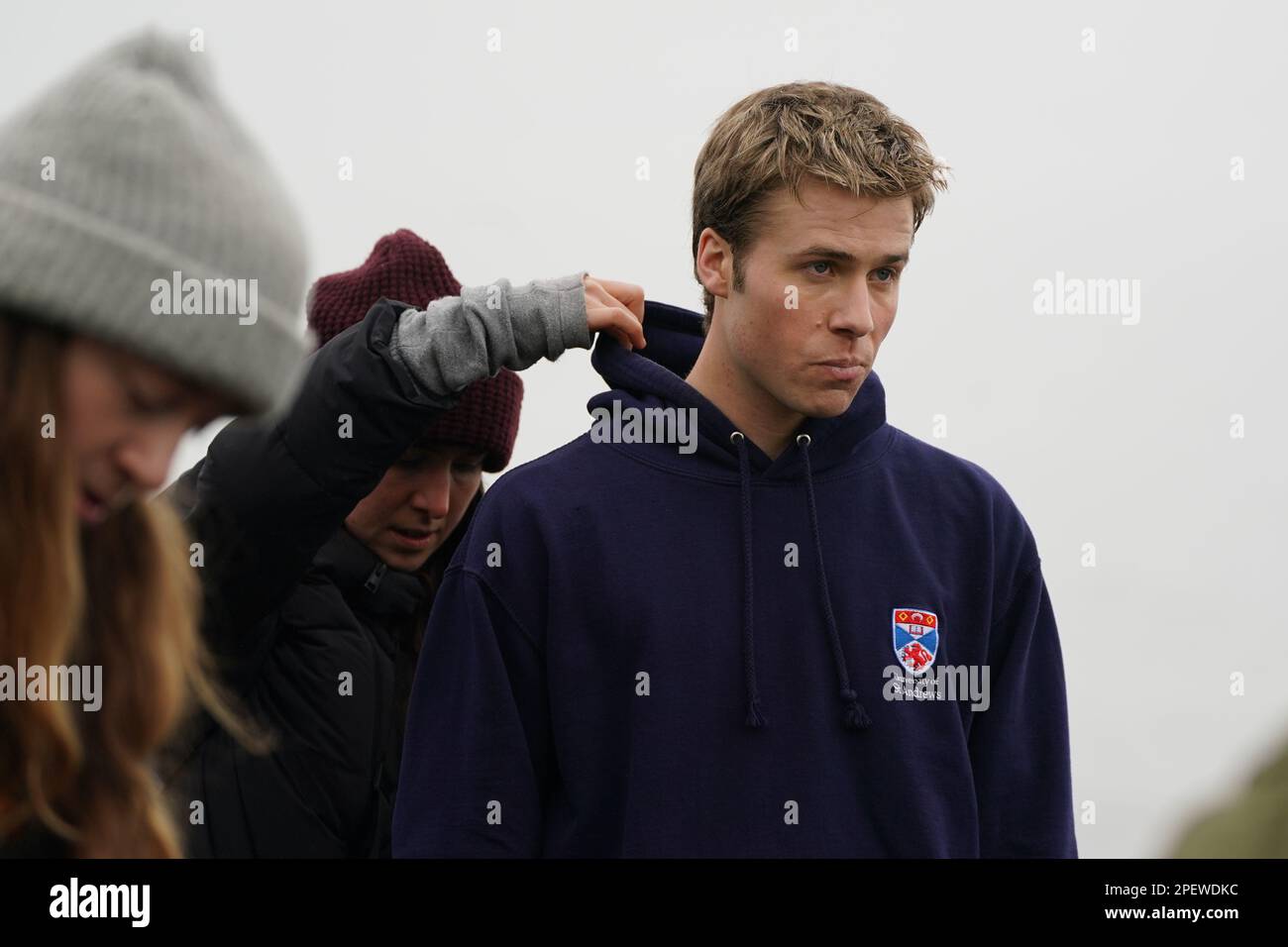Actor Ed McVey, who plays the part of Prince William, on set in between ...
