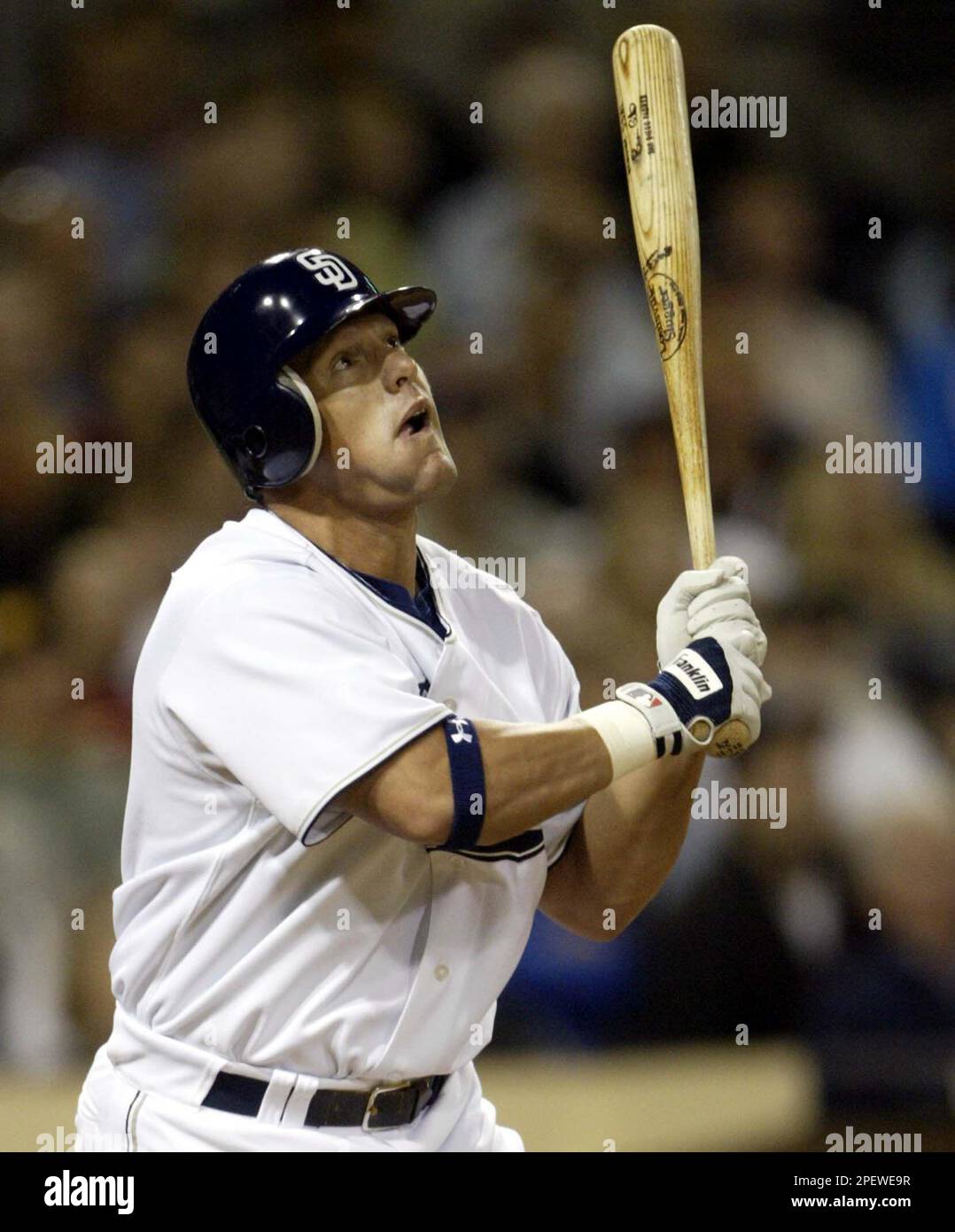 San Diego Padres' Brian Giles stands at home plate as he watches the ...