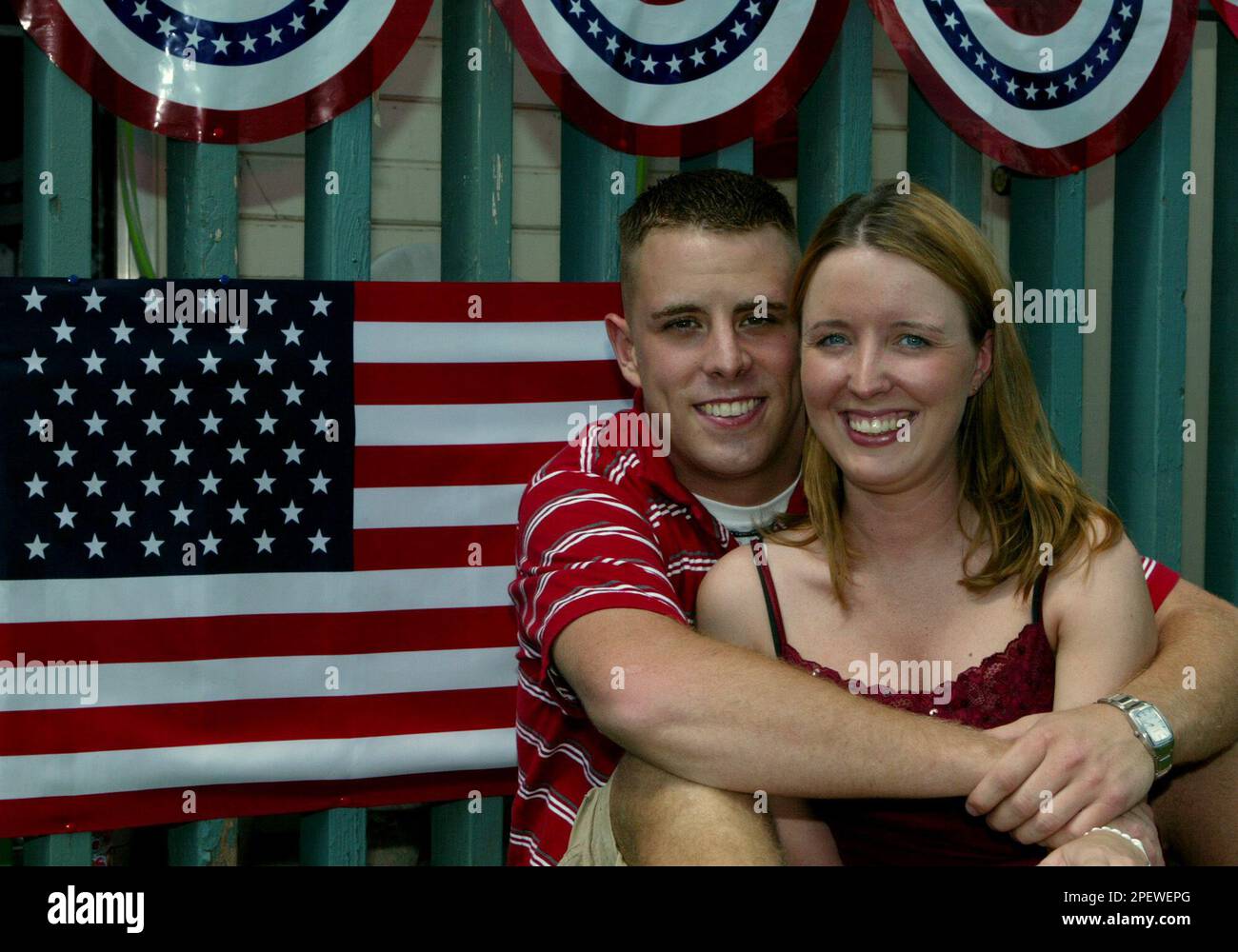 Robert Card, left, poses for a photo with his girlfriend, Heather Bruce ...