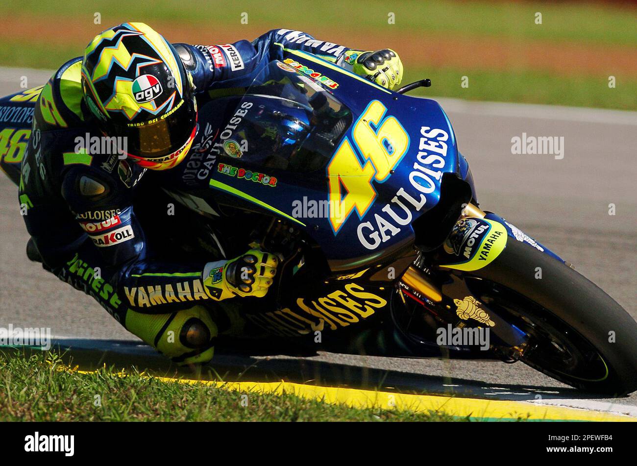 Italian Valentino Rossi rides his Yamaha motorcycle during a free ...