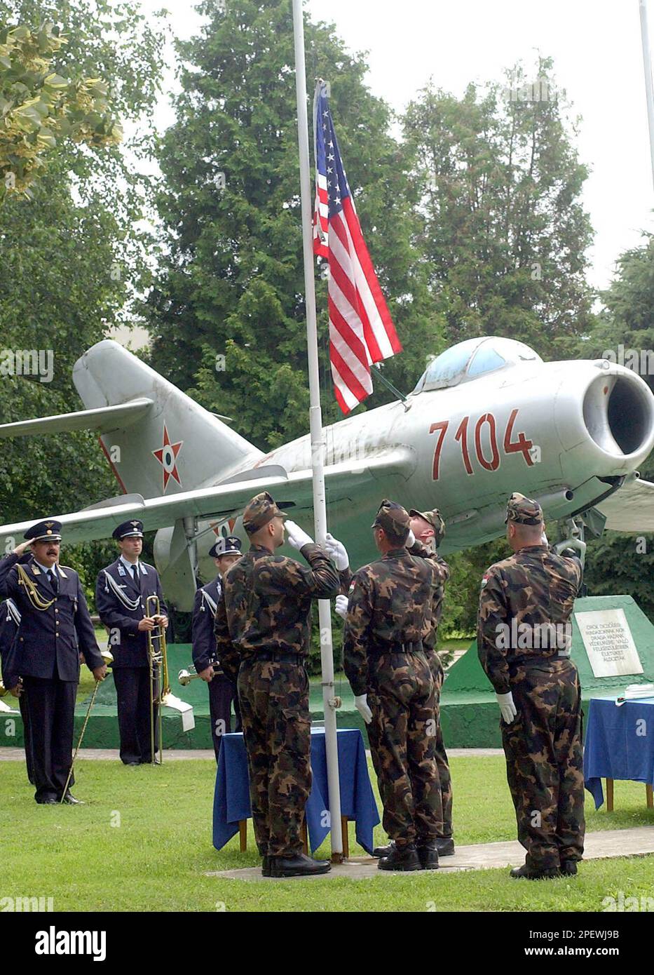 The US flag is lowered by Hungarian soldiers during a farewell ceremony ...