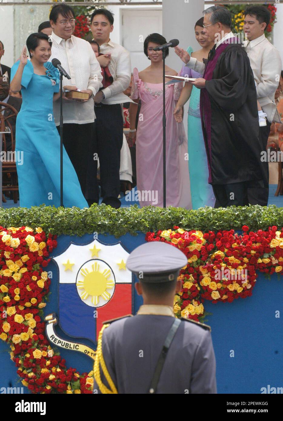 Witnessed by family members, Philippine President Gloria Macapagal ...