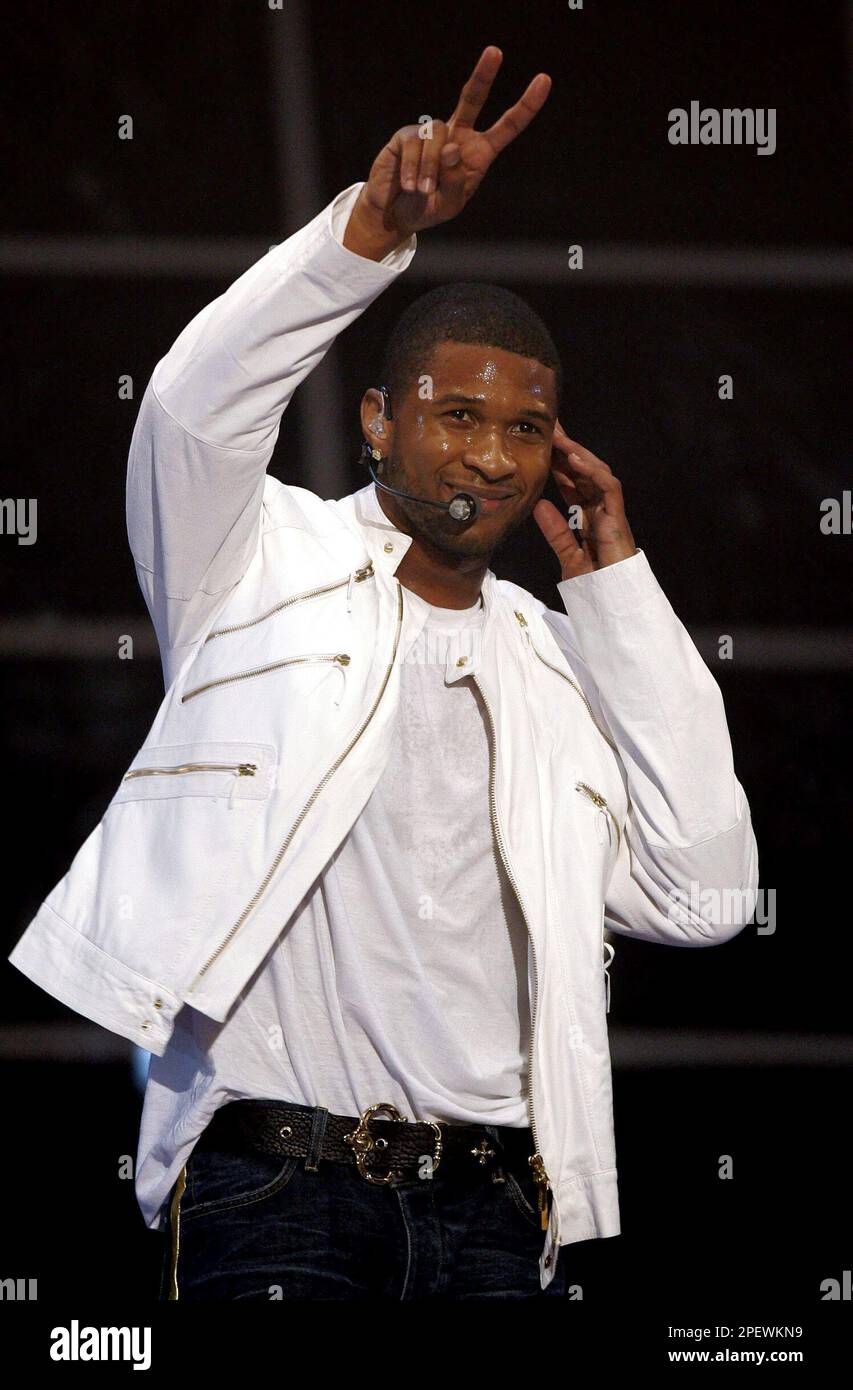 R&B artist Usher gestures after performing during the BET Awards ...
