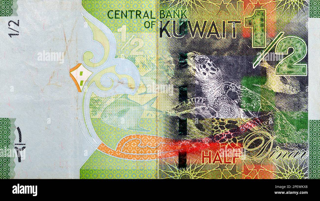 Large fragment of the reverse side of Kuwaiti half dinar green paper ...
