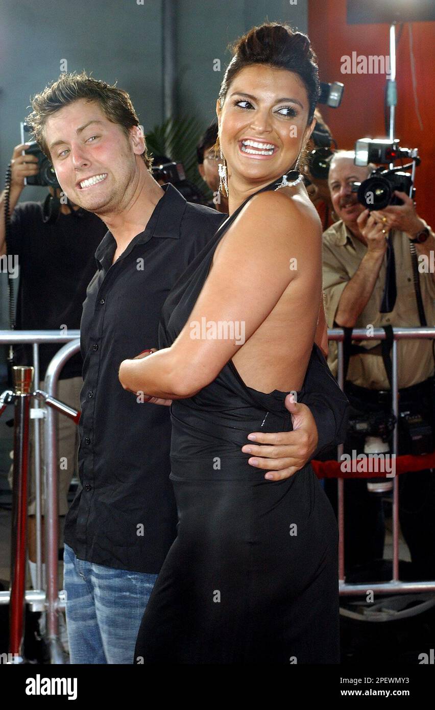 Singer Lance Bass of 'N Sync, left, and his unidentified date pose for ...
