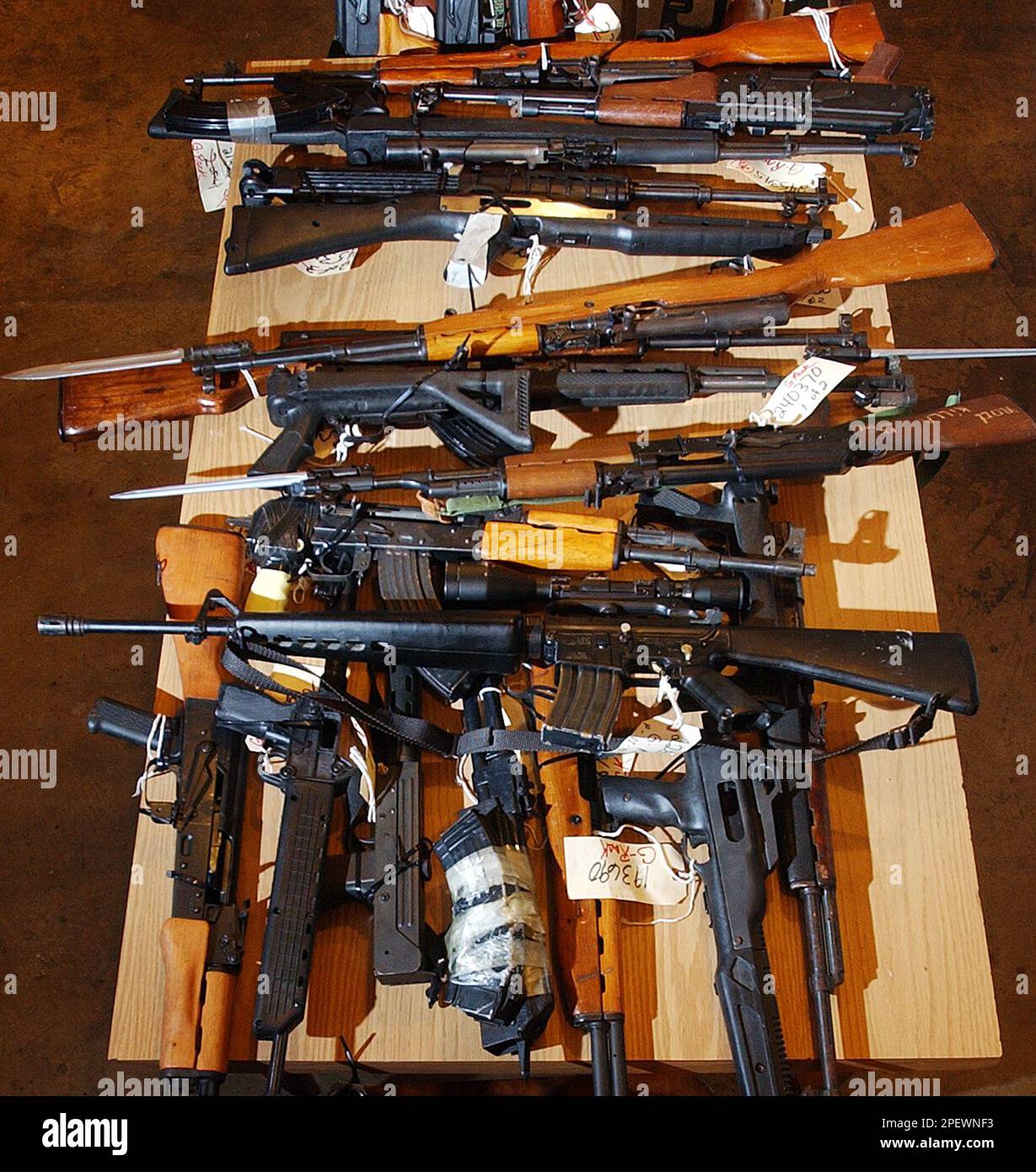 A table of semiautomatic weapons are displayed in the Montgomery, Ala ...