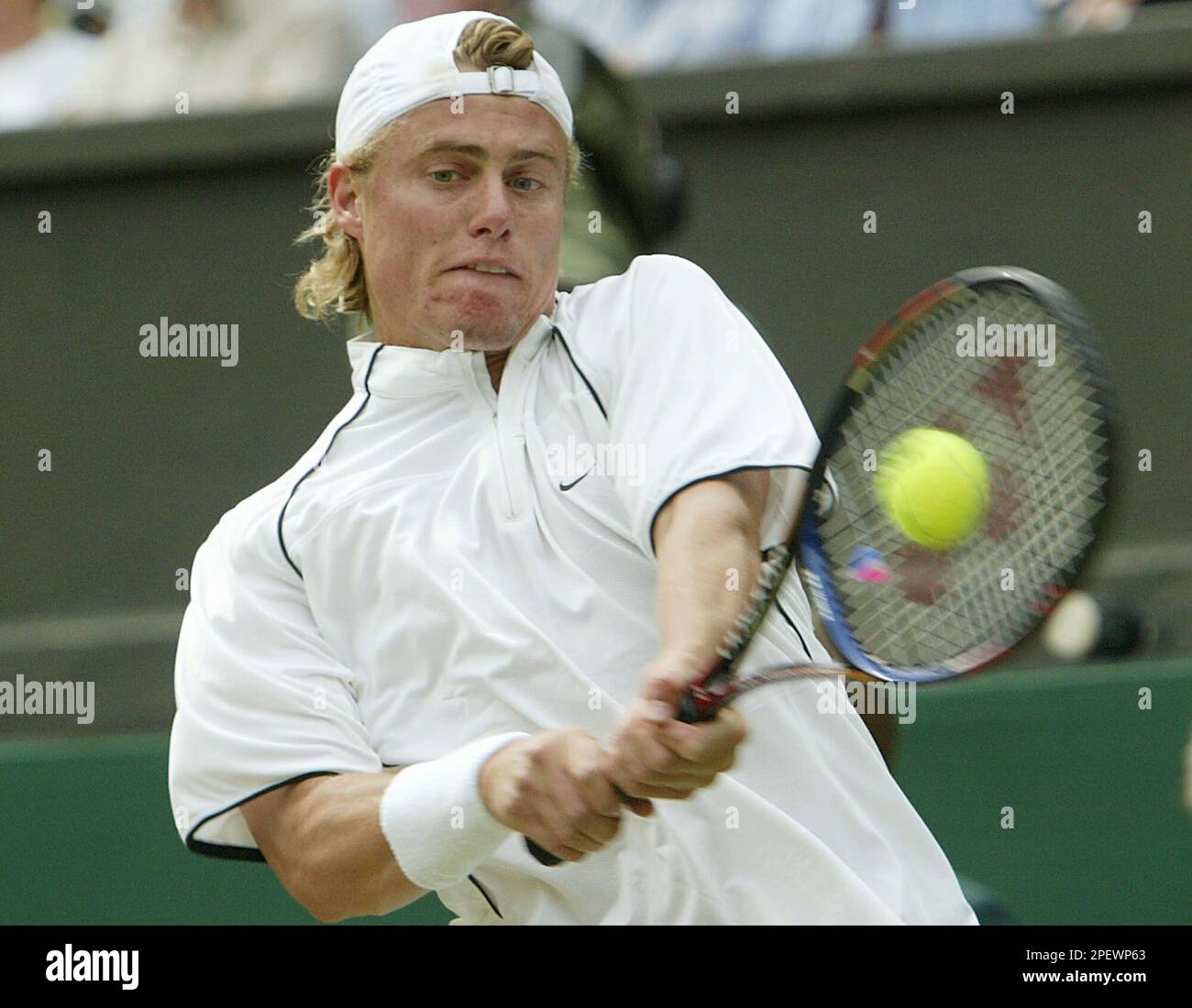Australia's Lleyton Hewitt rturns to Spain's Carlos Moya, during their ...