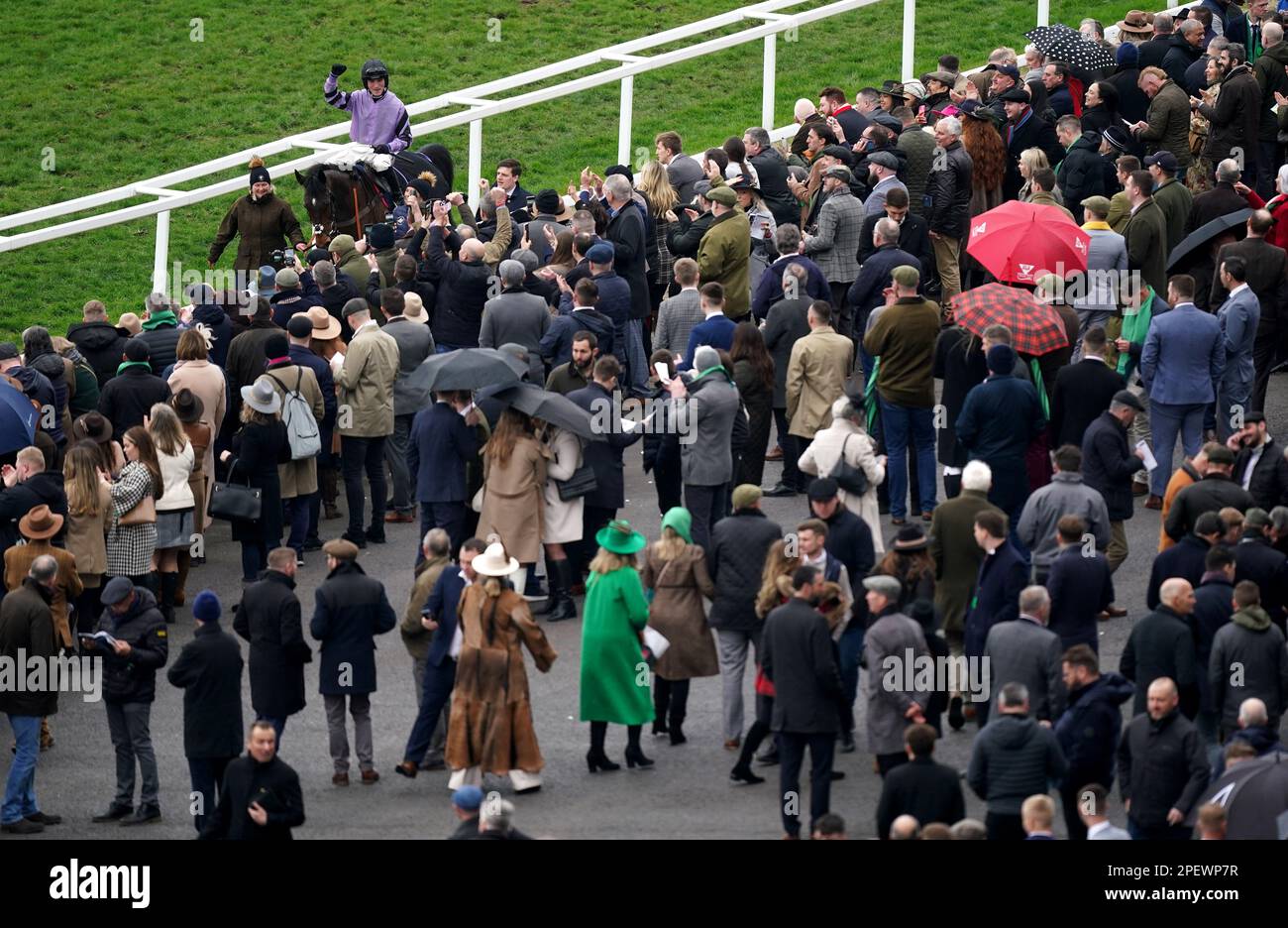 Harry Cobden celebrates after winning the Turners Novices' Chase aboard ...