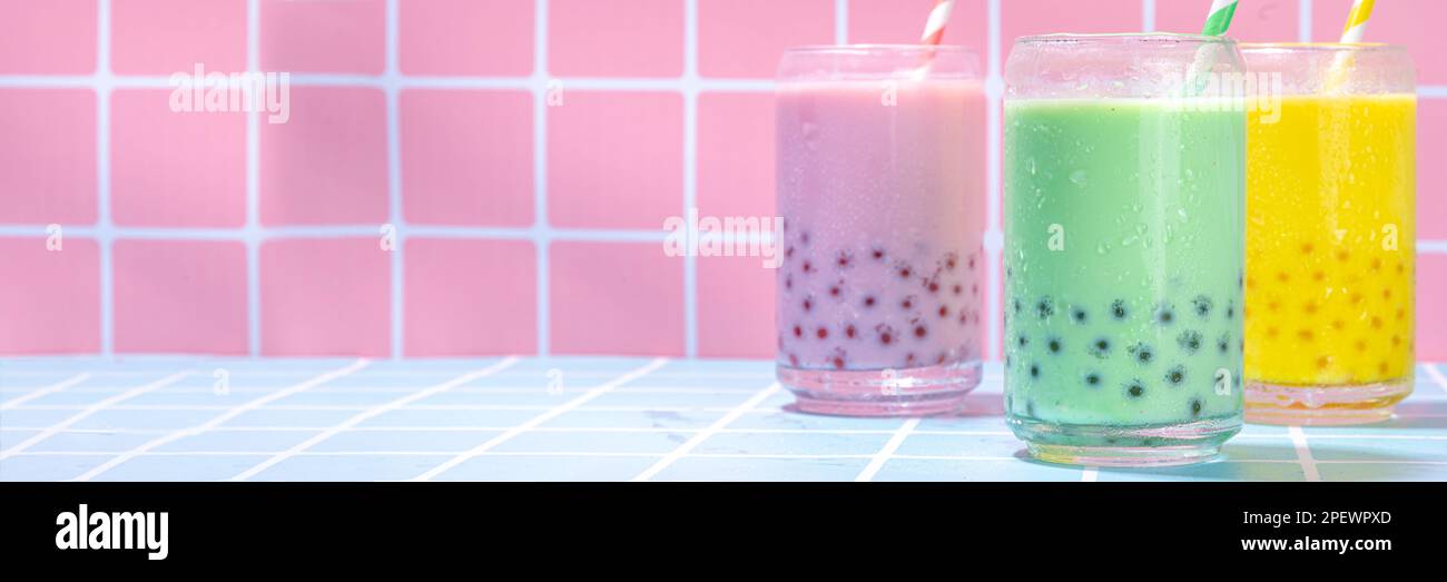 Set of three colorful summer bubble tea, bright creamy pearl tea or ...