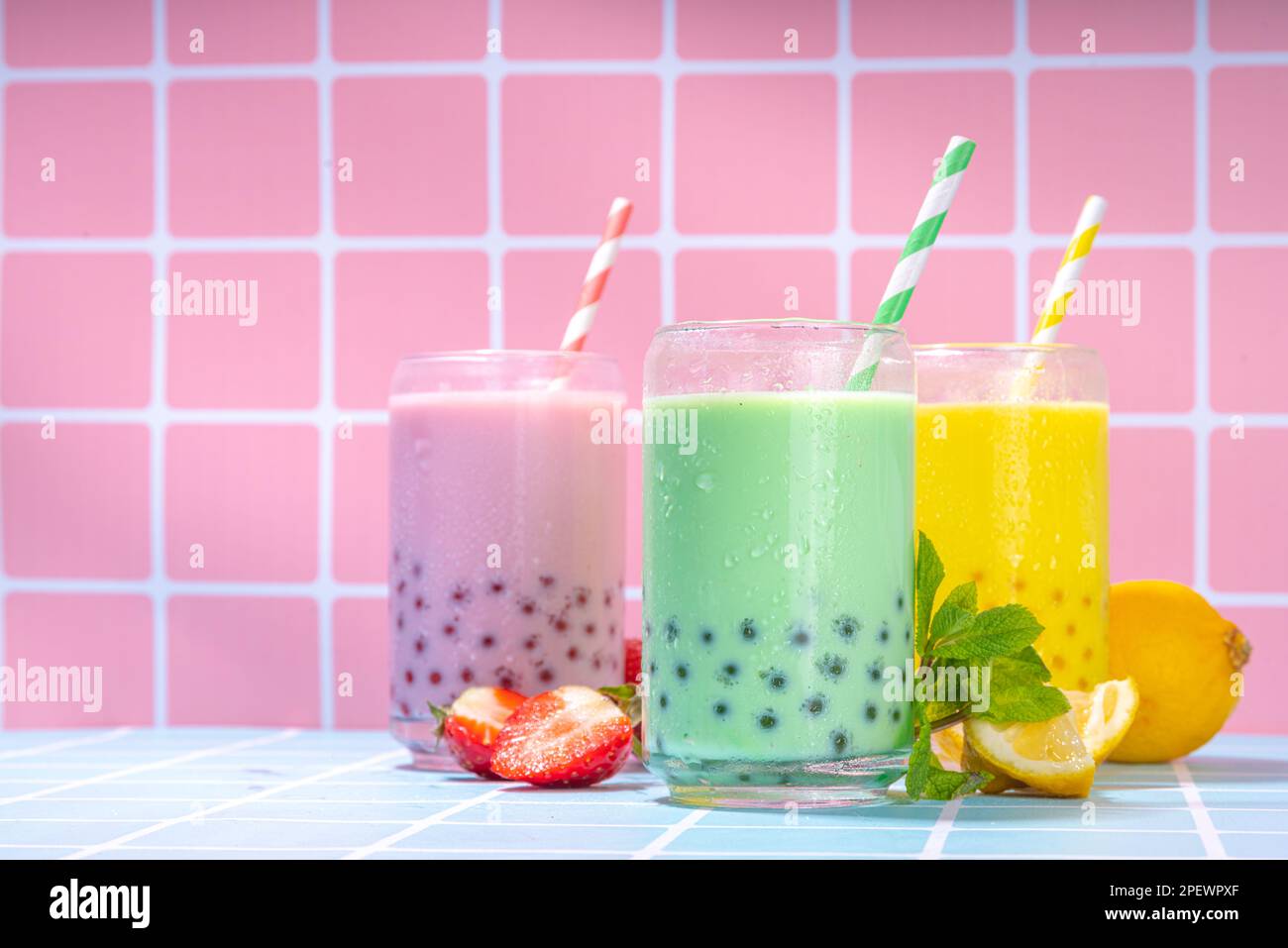 Set of three colorful summer bubble tea, bright creamy pearl tea or ...