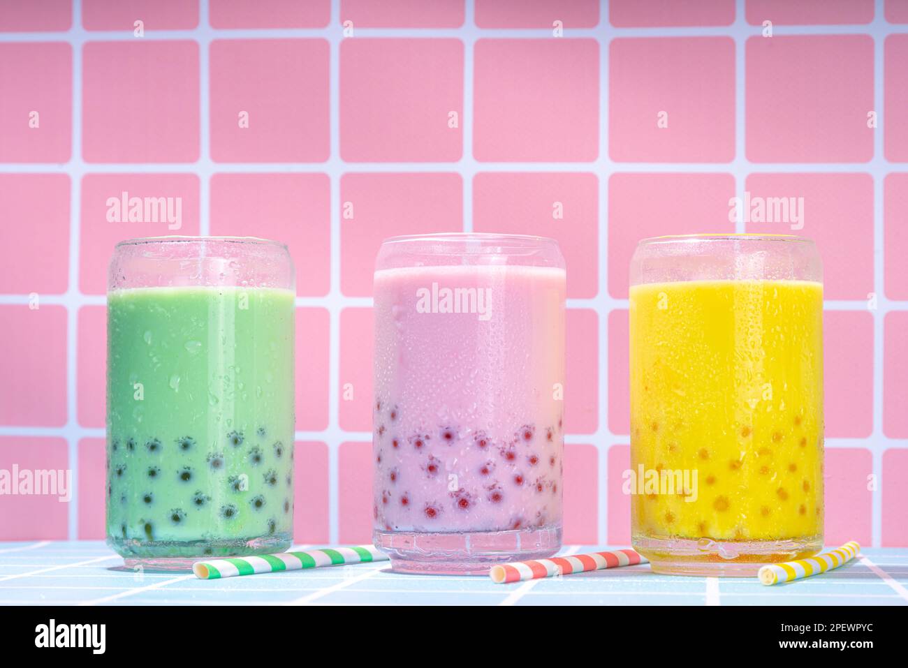 Set of three colorful summer bubble tea, bright creamy pearl tea or ...