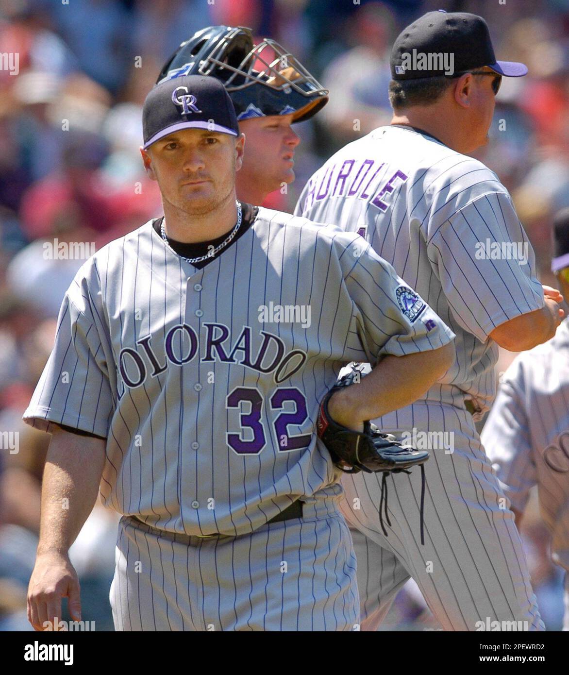 Colorado Rockies pitcher Jason Jennings (32) walks to the dugout after ...