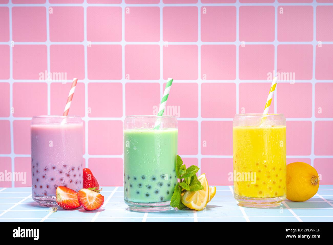 Set of three colorful summer bubble tea, bright creamy pearl tea or ...