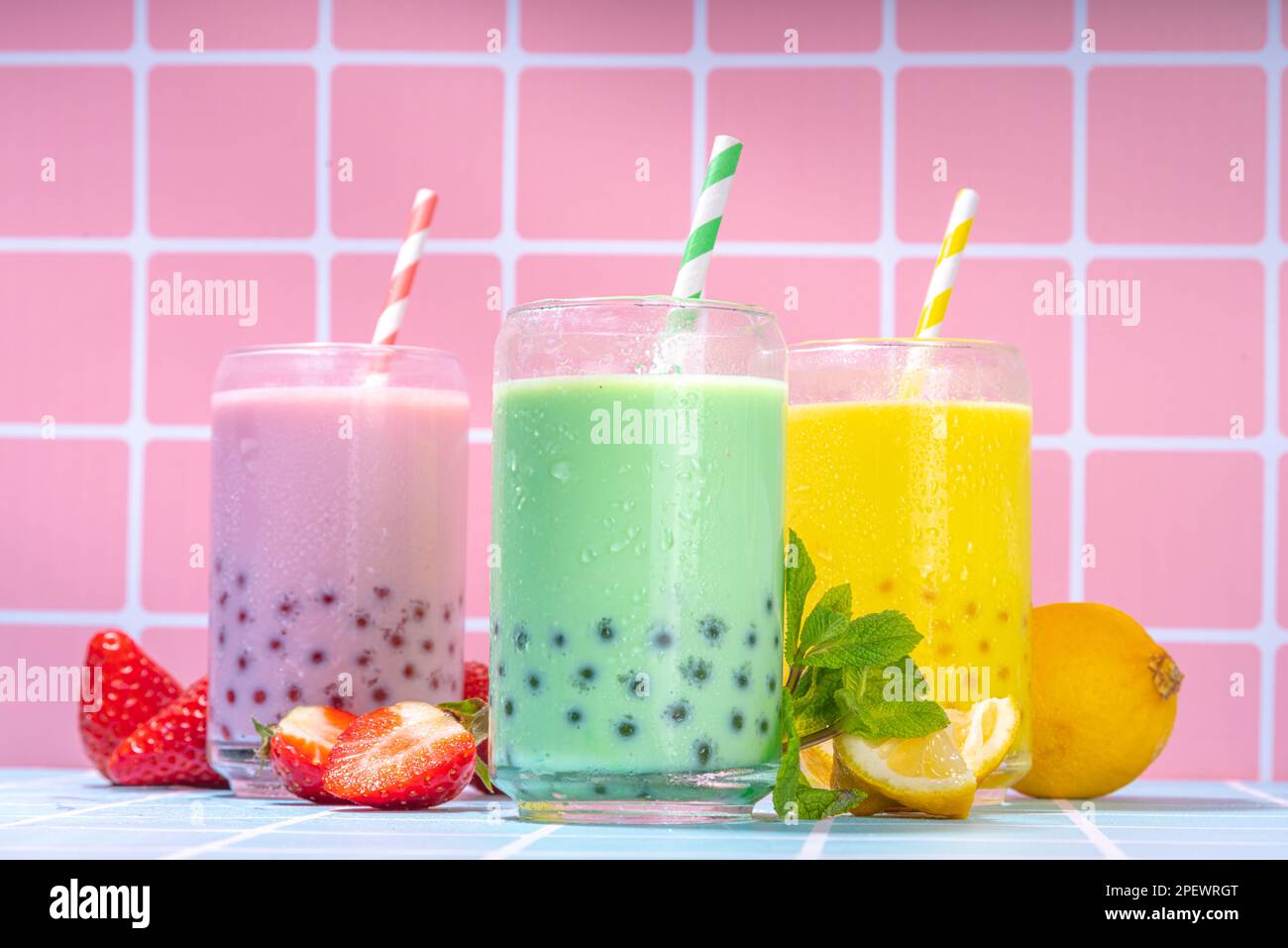Set of three colorful summer bubble tea, bright creamy pearl tea or ...