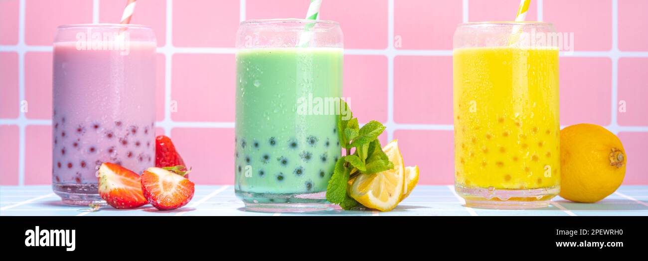 Set of three colorful summer bubble tea, bright creamy pearl tea or ...
