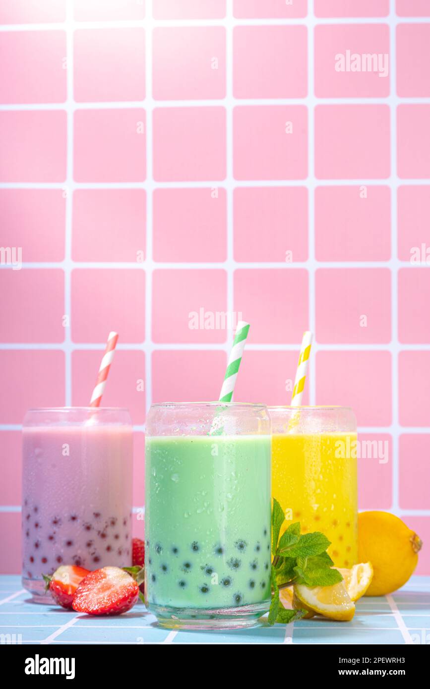 Set of three colorful summer bubble tea, bright creamy pearl tea or ...