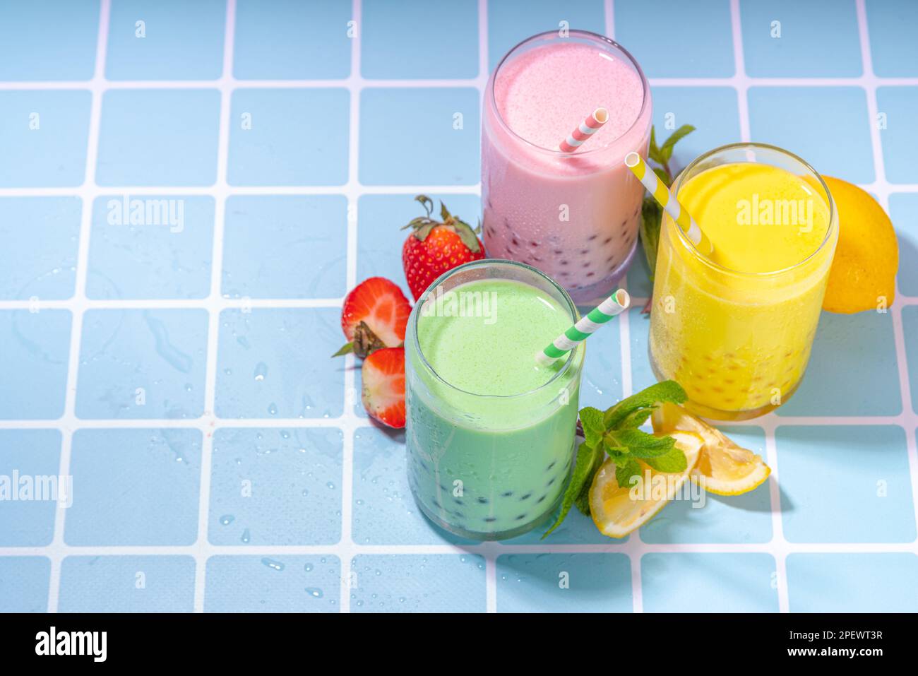 Set of three colorful summer bubble tea, bright creamy pearl tea or ...