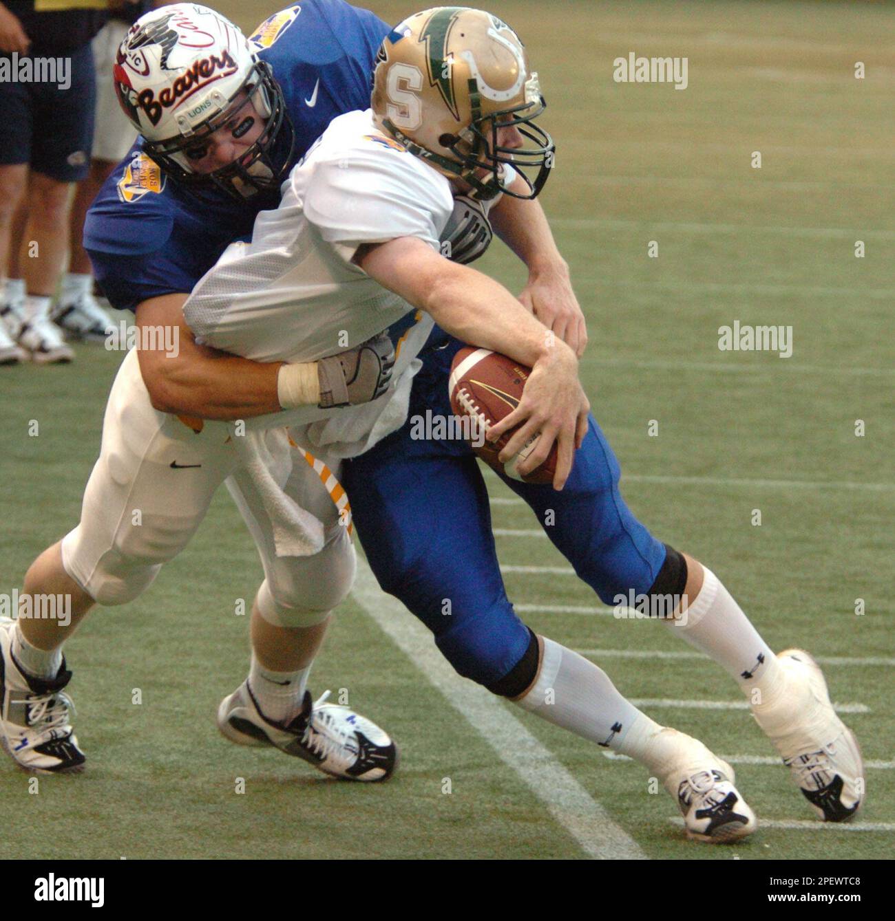 North's Greg Laybourn of Beaverton pulls South's Josh Riddell of McKay ...