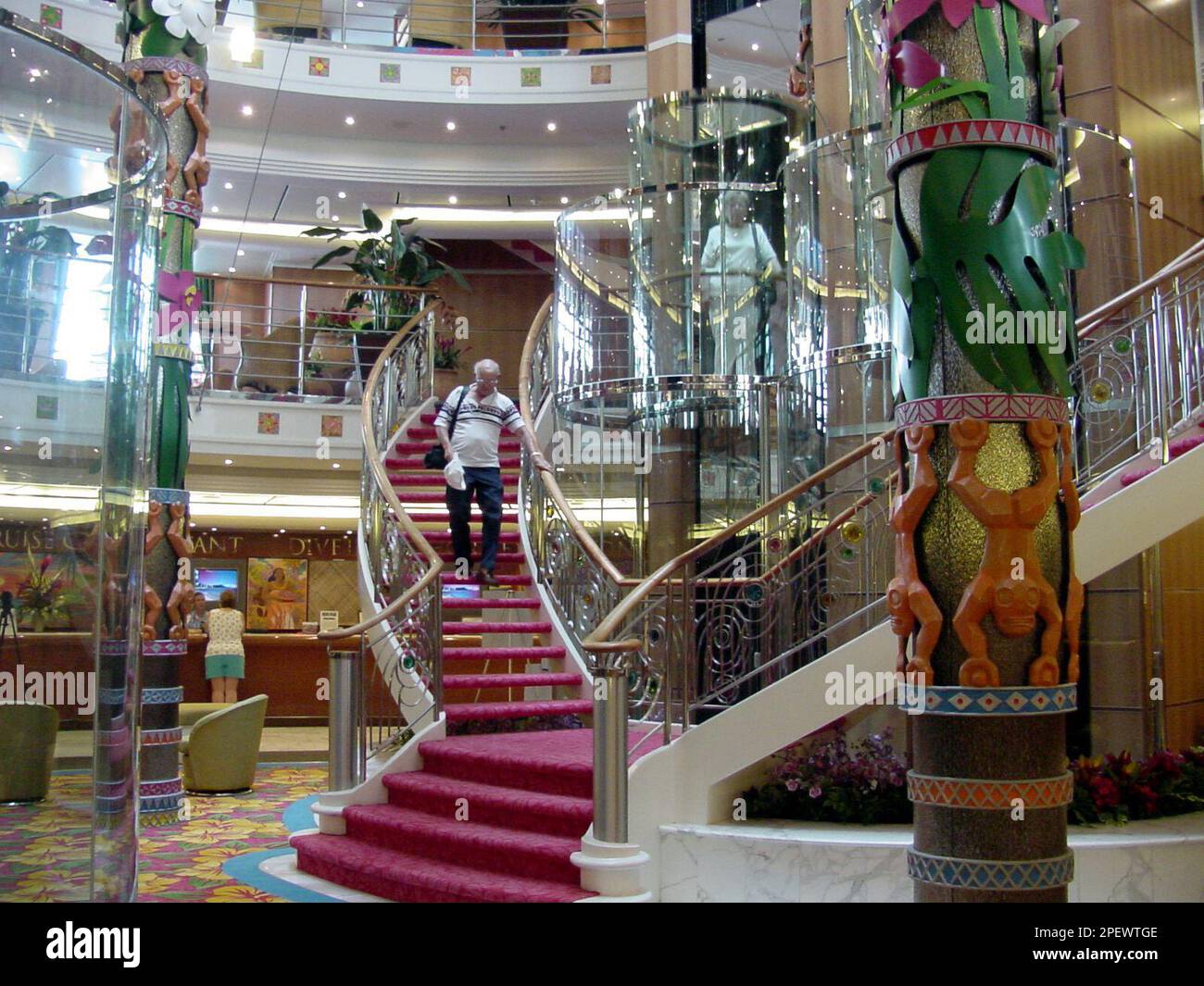 A passenger walks down the stairs of the Aloha Atrium, Saturday, June ...