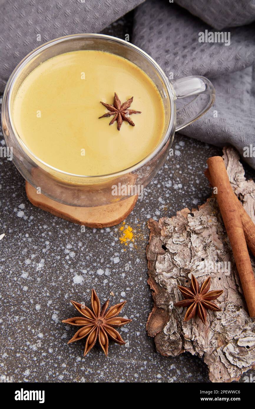 Natural organic masala tea with star anise, cinnamon on tree bark ...