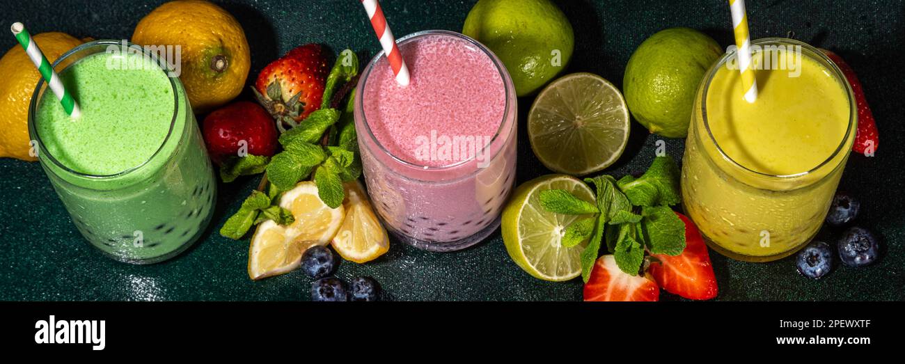 Set of three colorful summer bubble tea, bright creamy pearl tea or ...