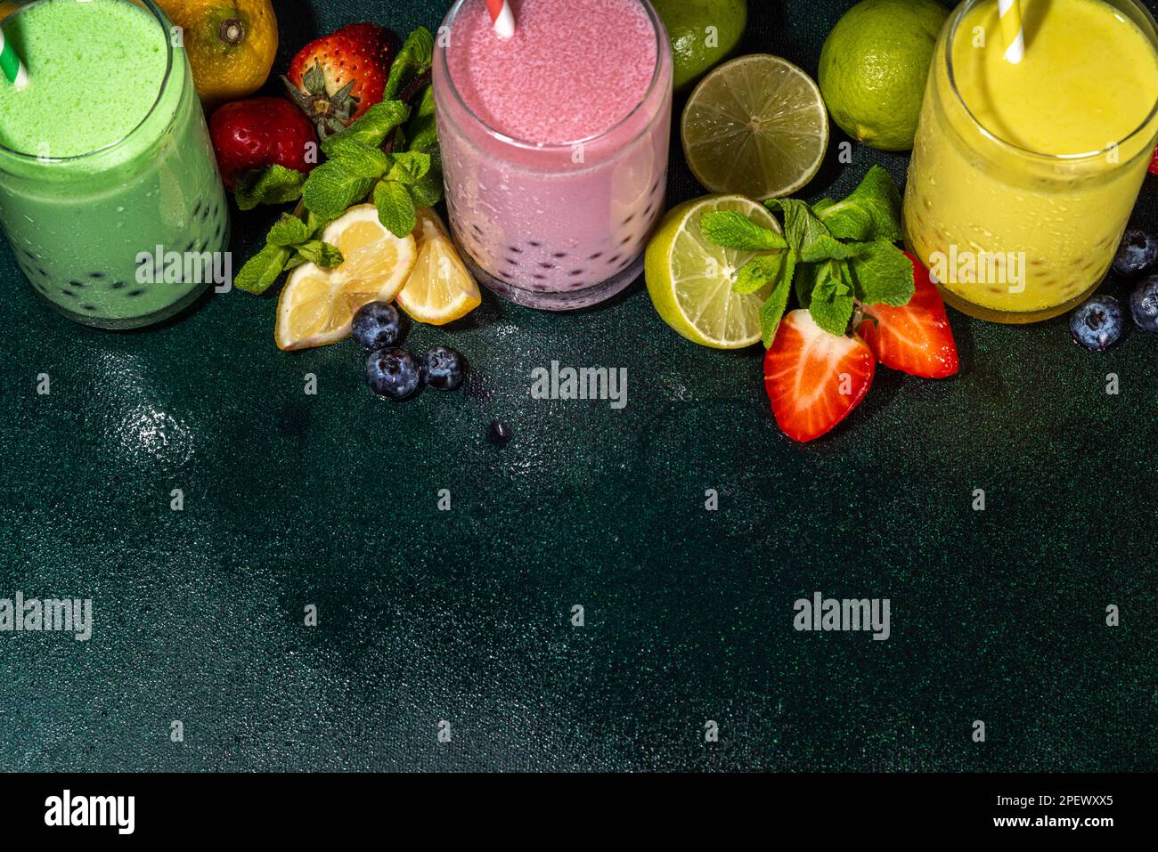 Set of three colorful summer bubble tea, bright creamy pearl tea or ...