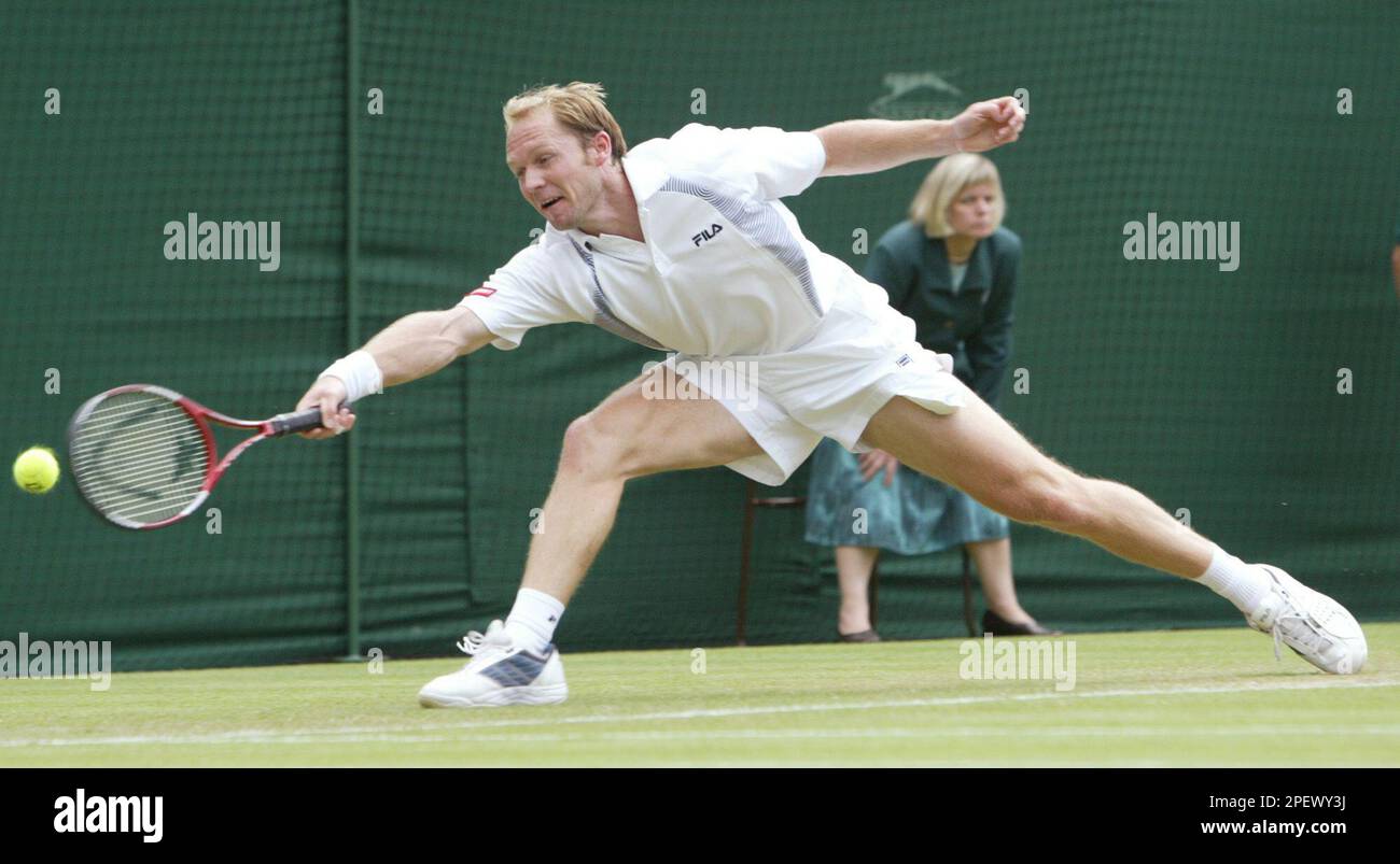 Germany's Rainer Schuettler, plays a return to Britain's Greg Rusedski ...