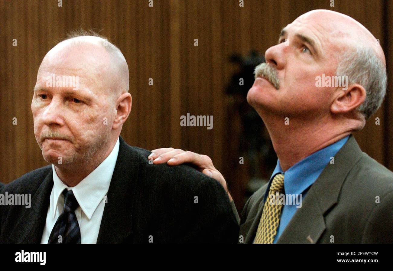 Mark Ducic, left, stands with his attorney, John Luskin, as he is ...