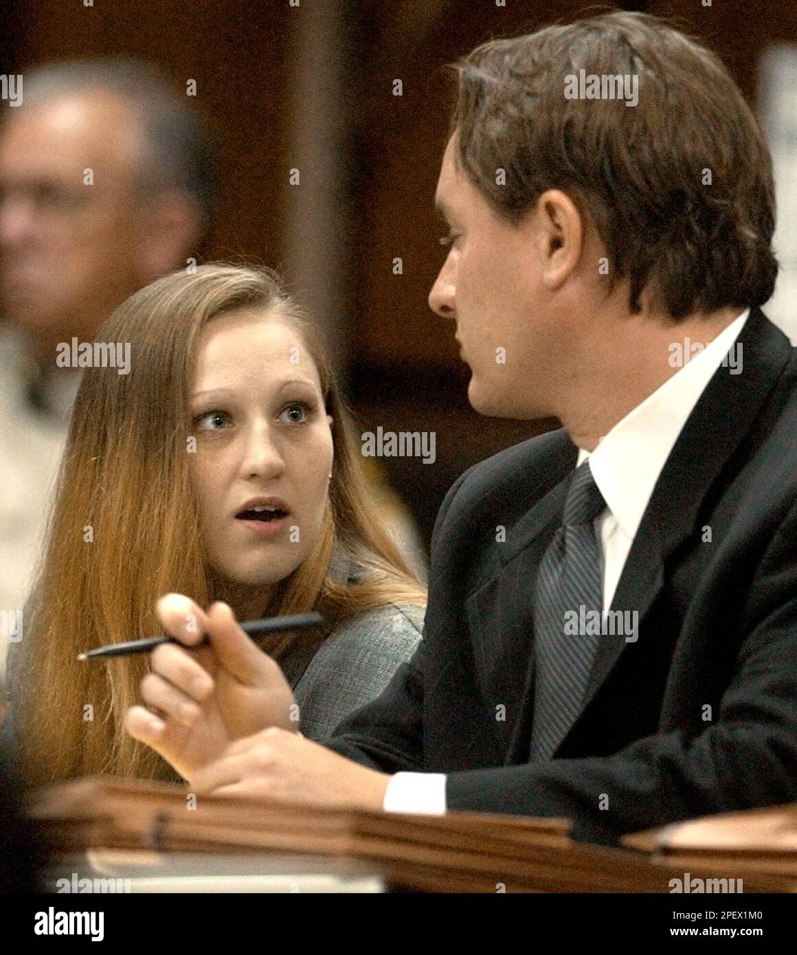 Fallon Tallent, left, talks with attorney David Boyd, right, during ...